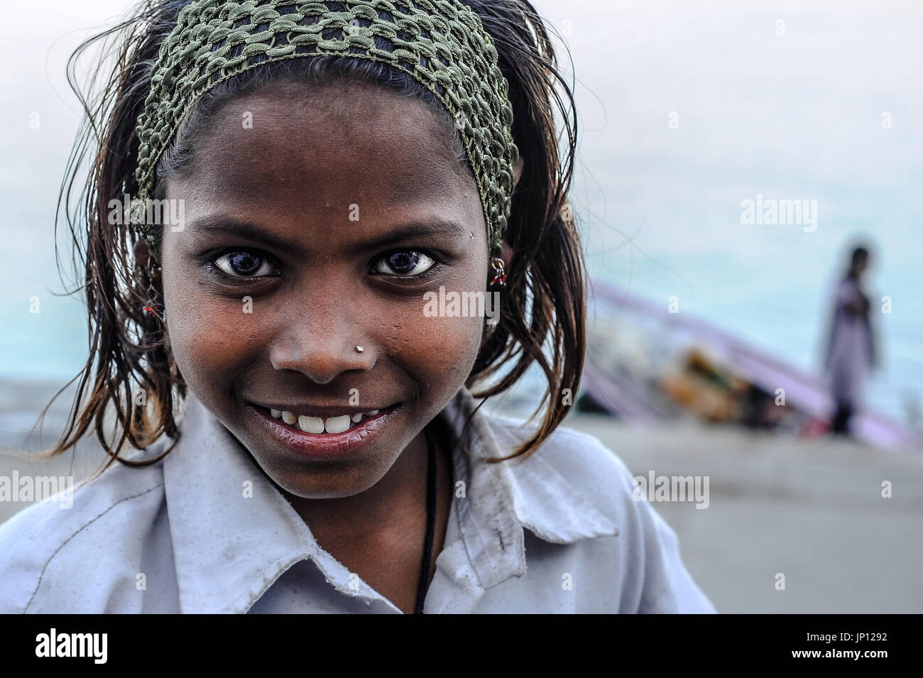 Portrait of a young Indian girl by the Ganges in Varanasi Stock Photo ...