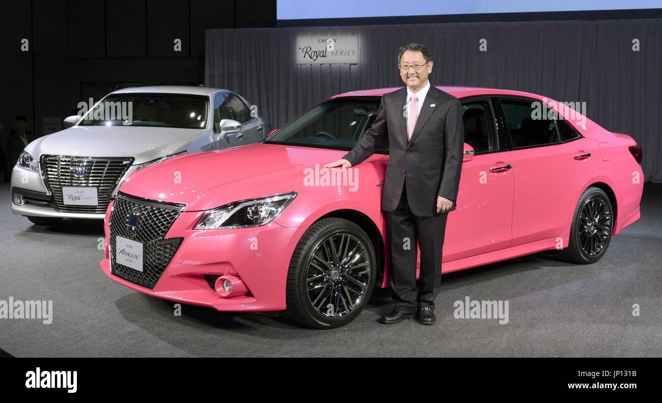 TOKYO, Japan - Toyota Motor Corp. President Akio Toyoda stands beside a ...
