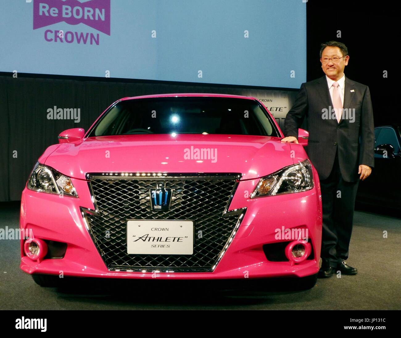 TOKYO, Japan - Toyota Motor Corp. President Akio Toyoda stands beside a ...