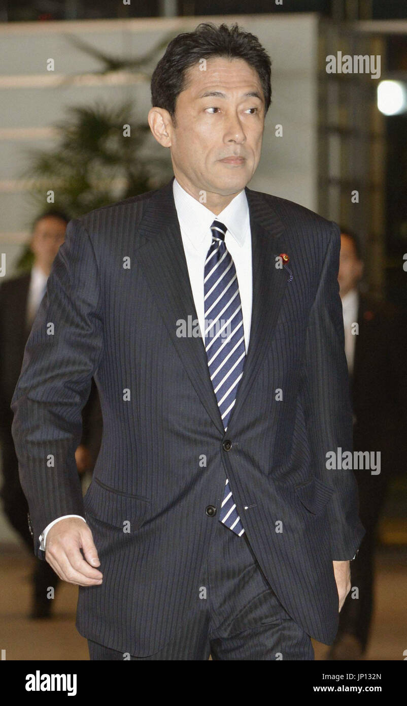 TOKYO, Japan - Fumio Kishida enters the prime minister's office in ...