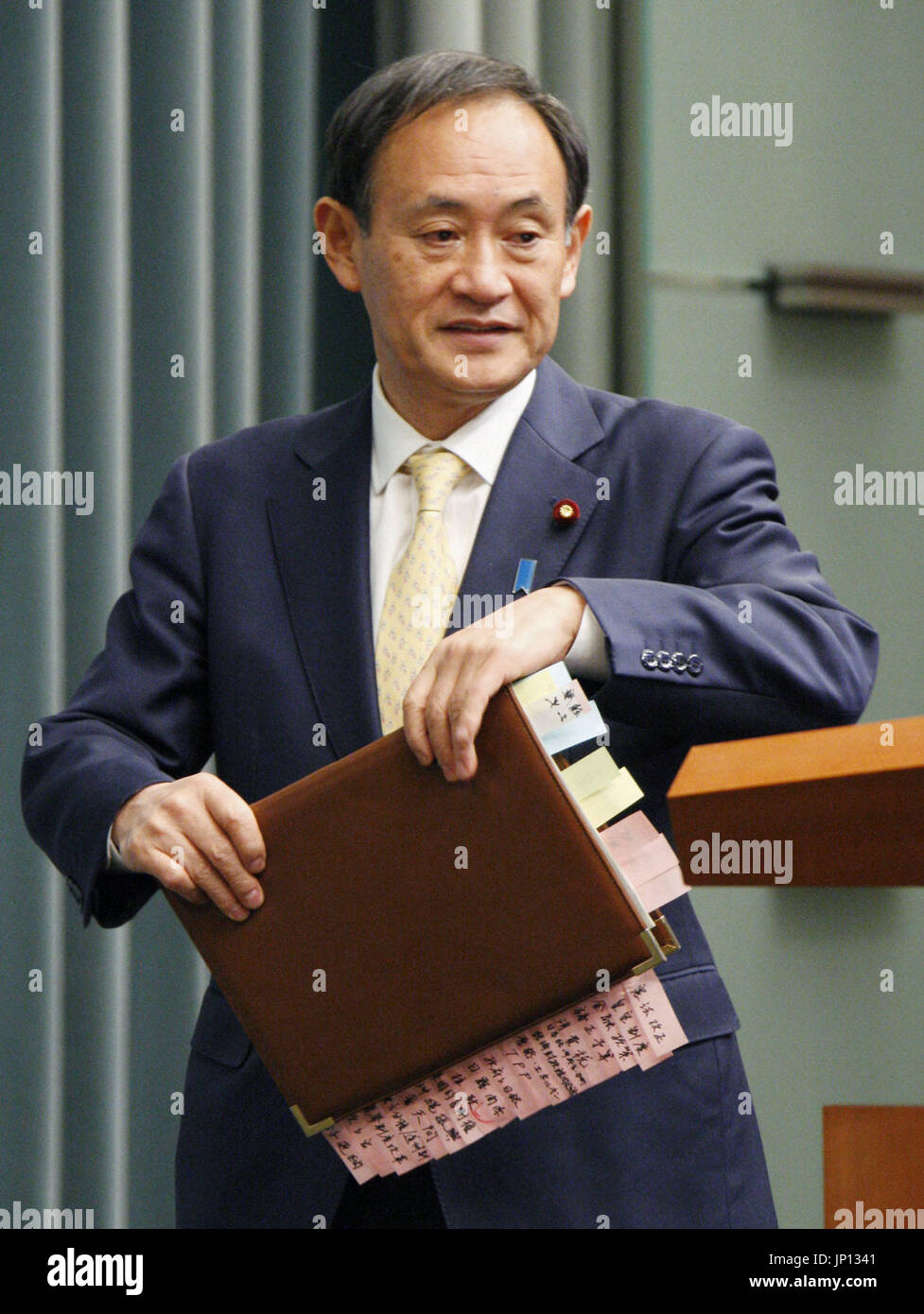 TOKYO, Japan - Japan's new Chief Cabinet Secretary Yoshihide Suga holds ...
