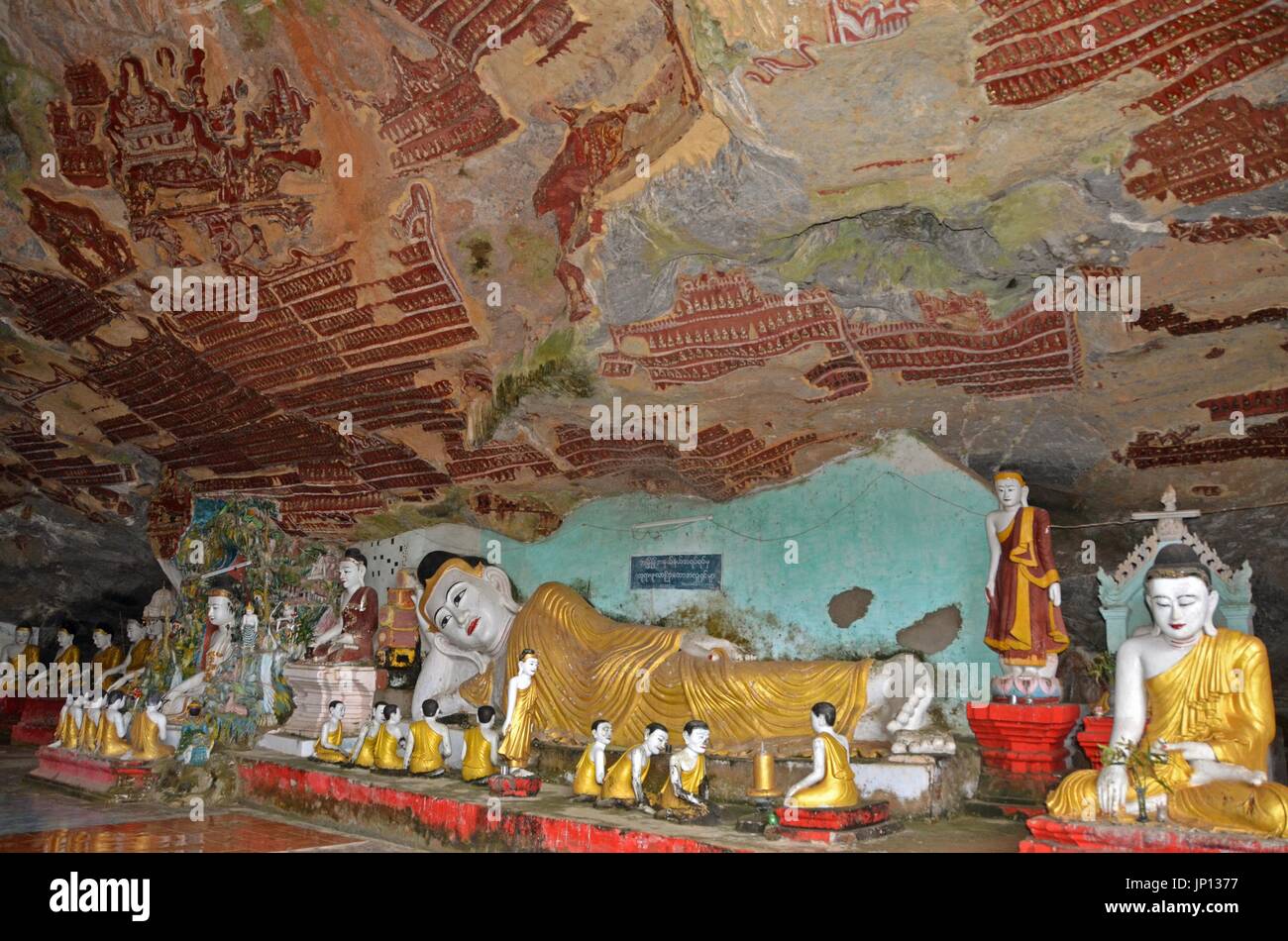 PHA-AN, Myanmar - Photo shows Buddhist statues and walls with small ...