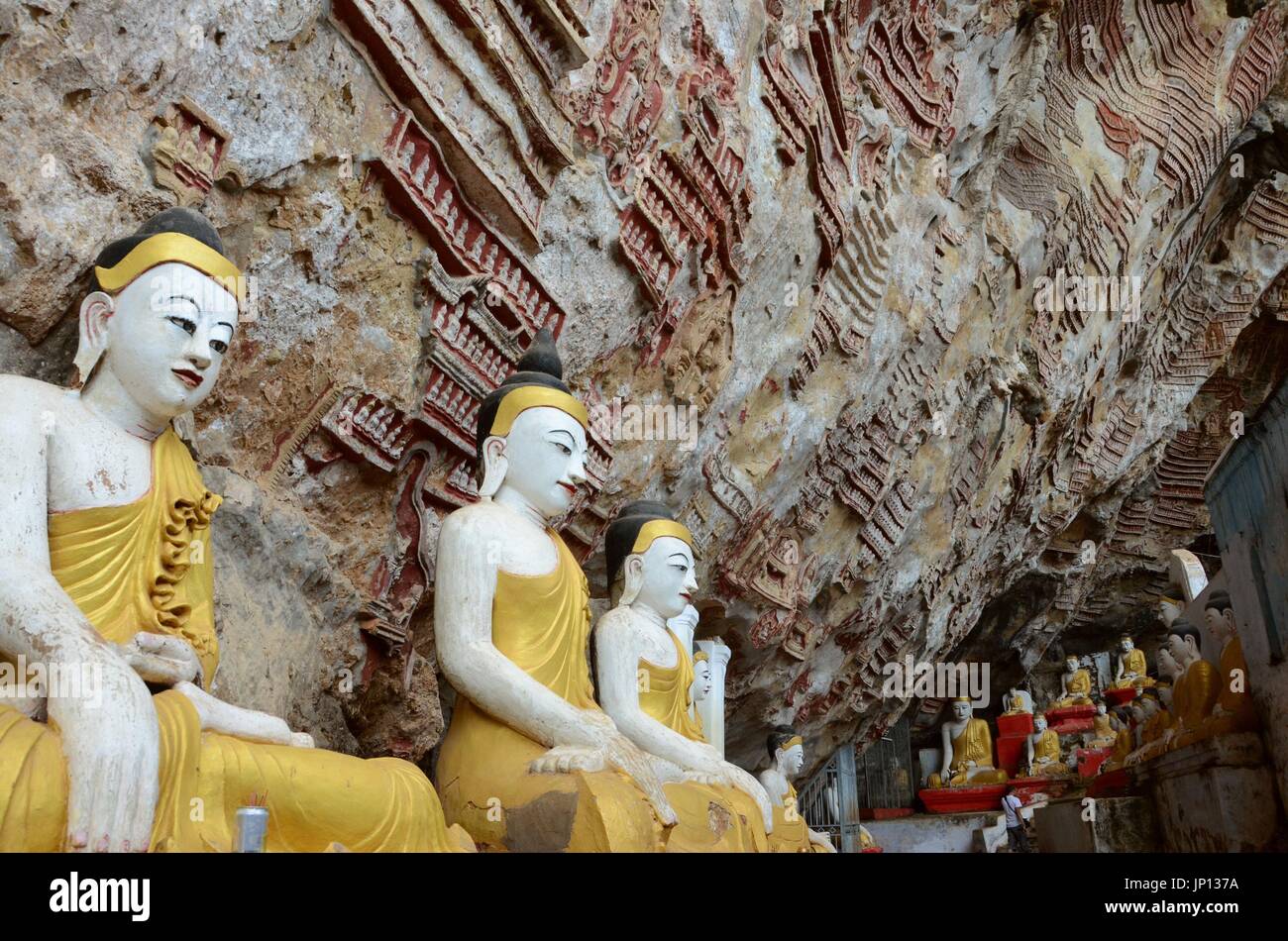 PHA-AN, Myanmar - Photo shows Buddhist statues and walls with small ...