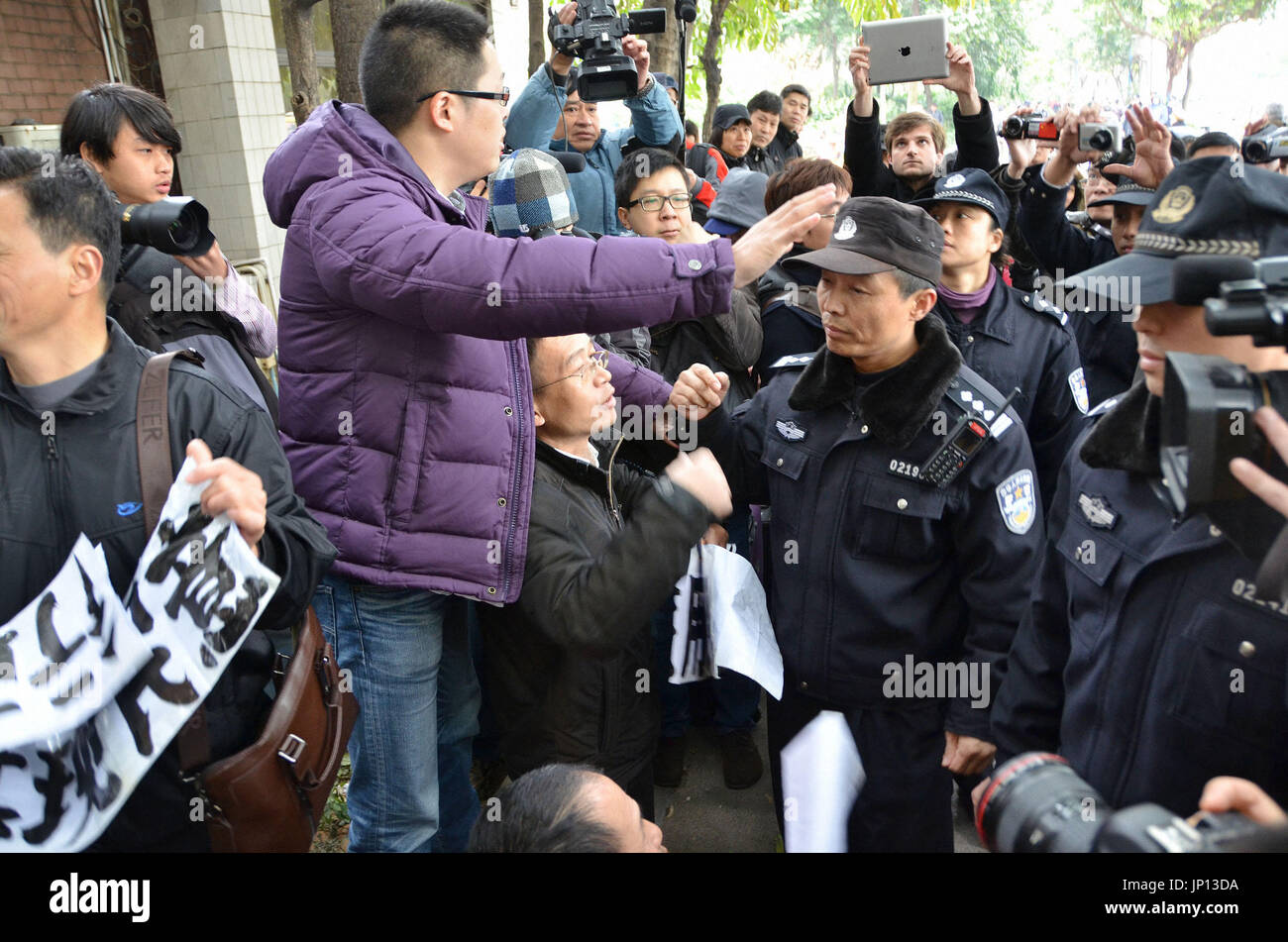 GUANGZHOU, China - People protesting against the government's violation ...