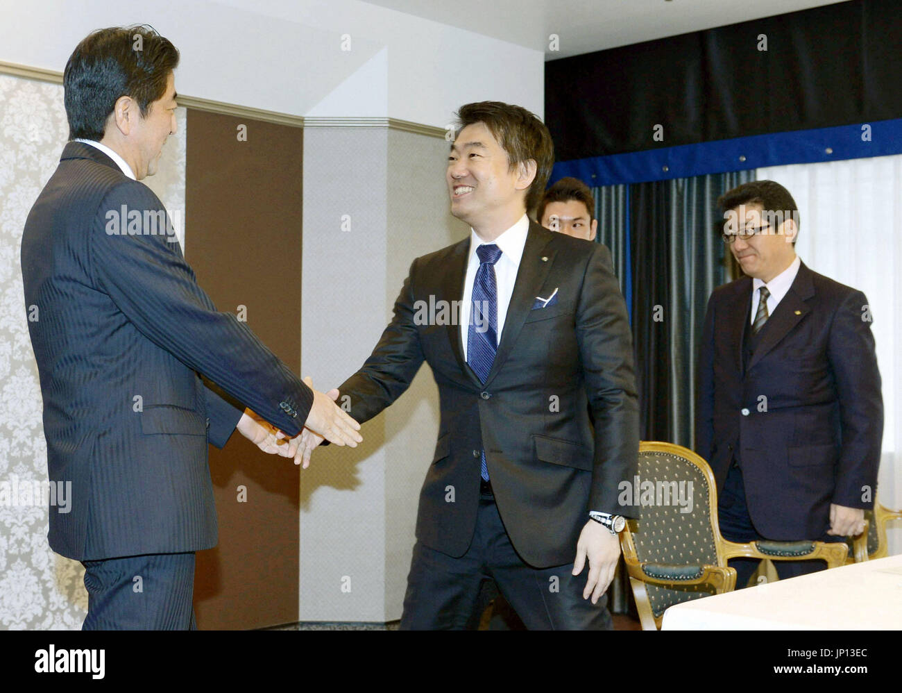 OSAKA, Japan - Japanese Prime Minister Shinzo Abe (L) and Toru ...
