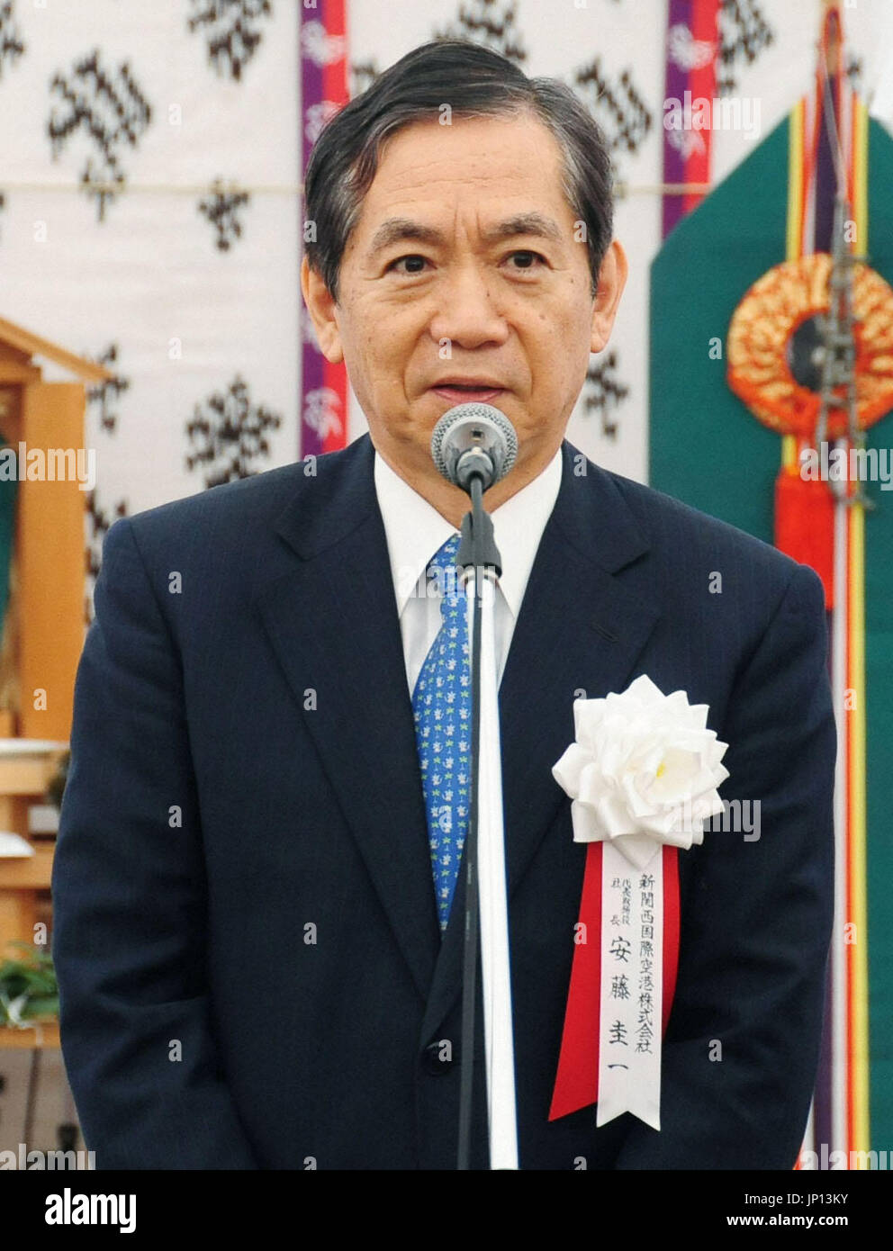 OSAKA, Japan - New Kansai International Airport Co. President Keiichi Ando speaks during a ...