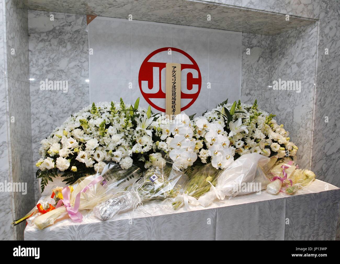 YOKOHAMA, Japan - Photo shows flowers laid at a temporary altar set up ...