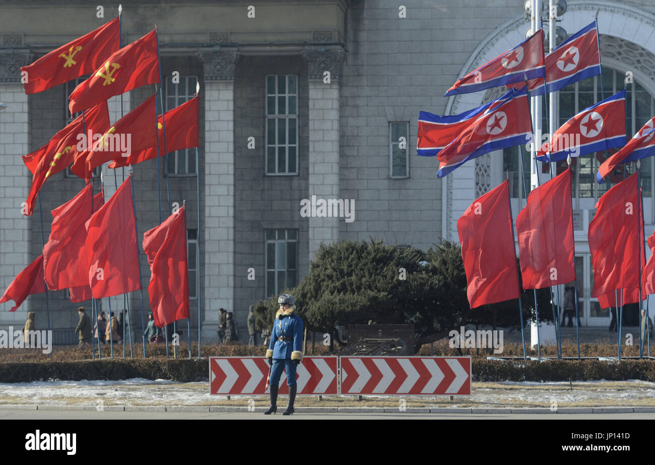 PYONGYANG, North Korea - Photo shows North Korean national flags (R ...