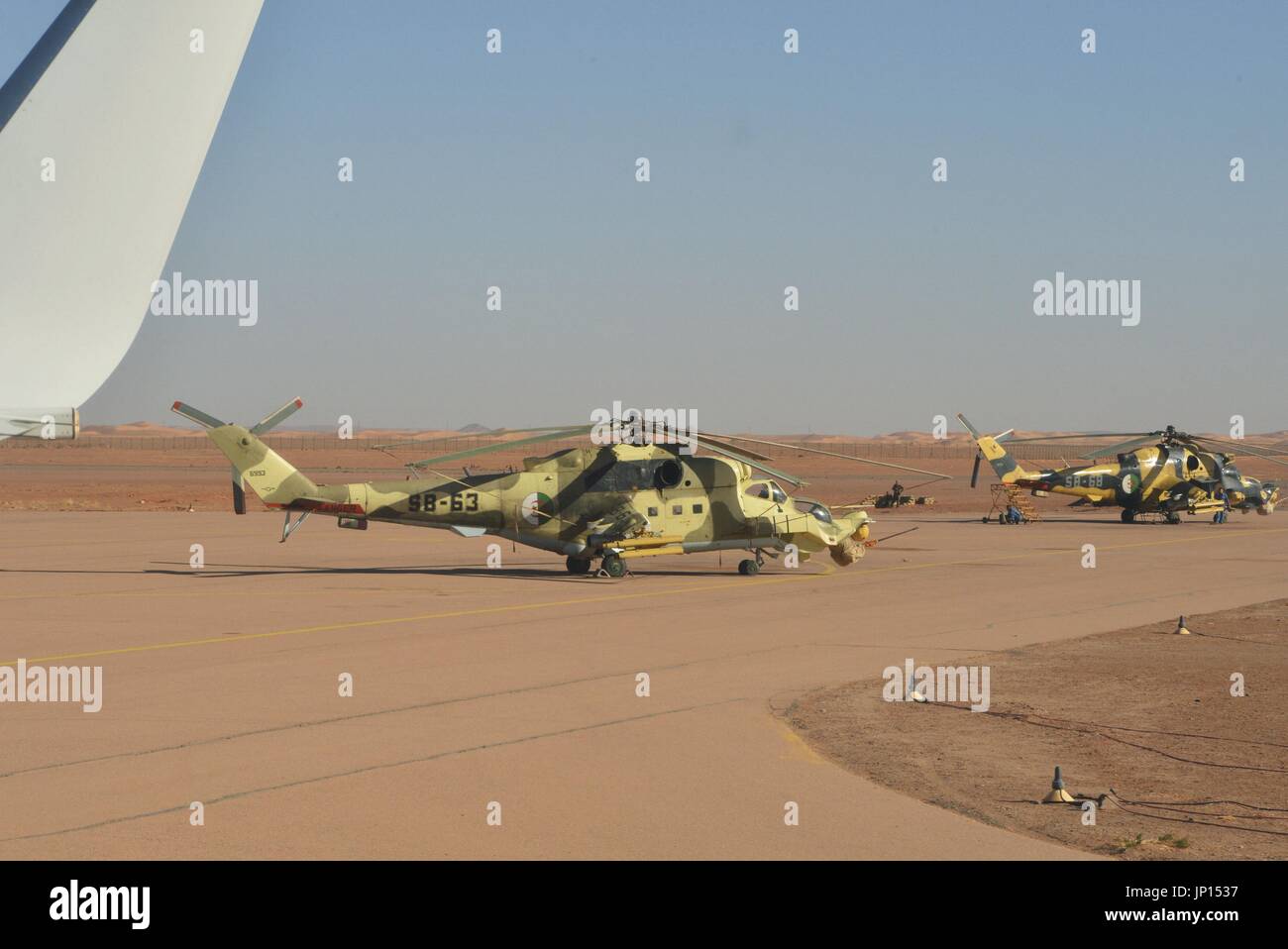 IN AMENAS, Algeria - Photo shows military helicopters parked at an ...