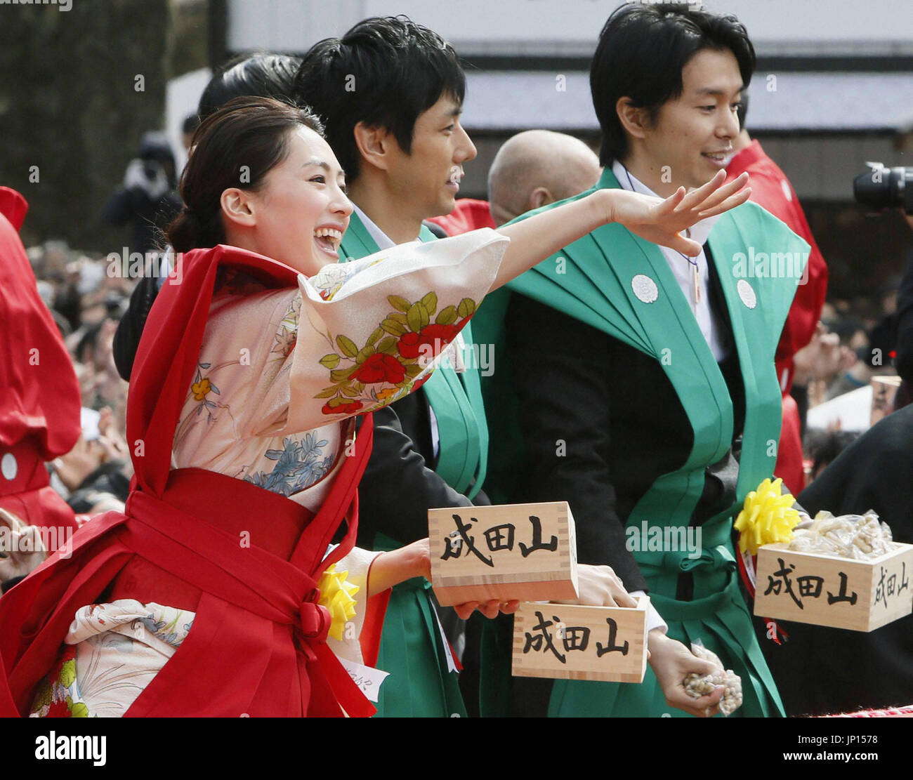 NARITA, Japan - Japanese actress Haruka Ayase (L) throws bags of beans ...