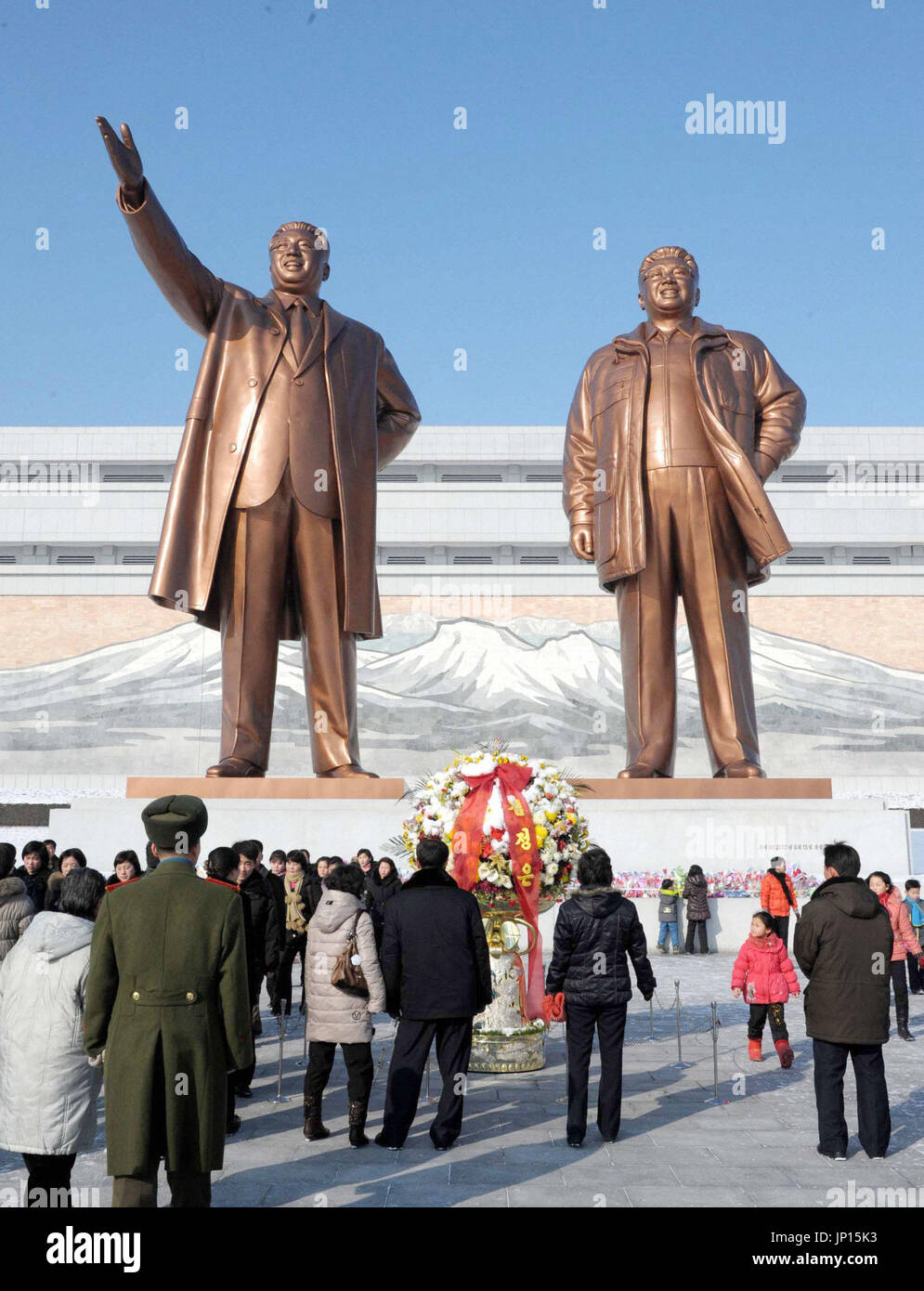 PYONGYANG, North Korea - People visit Mansu Hill, where statues of ...