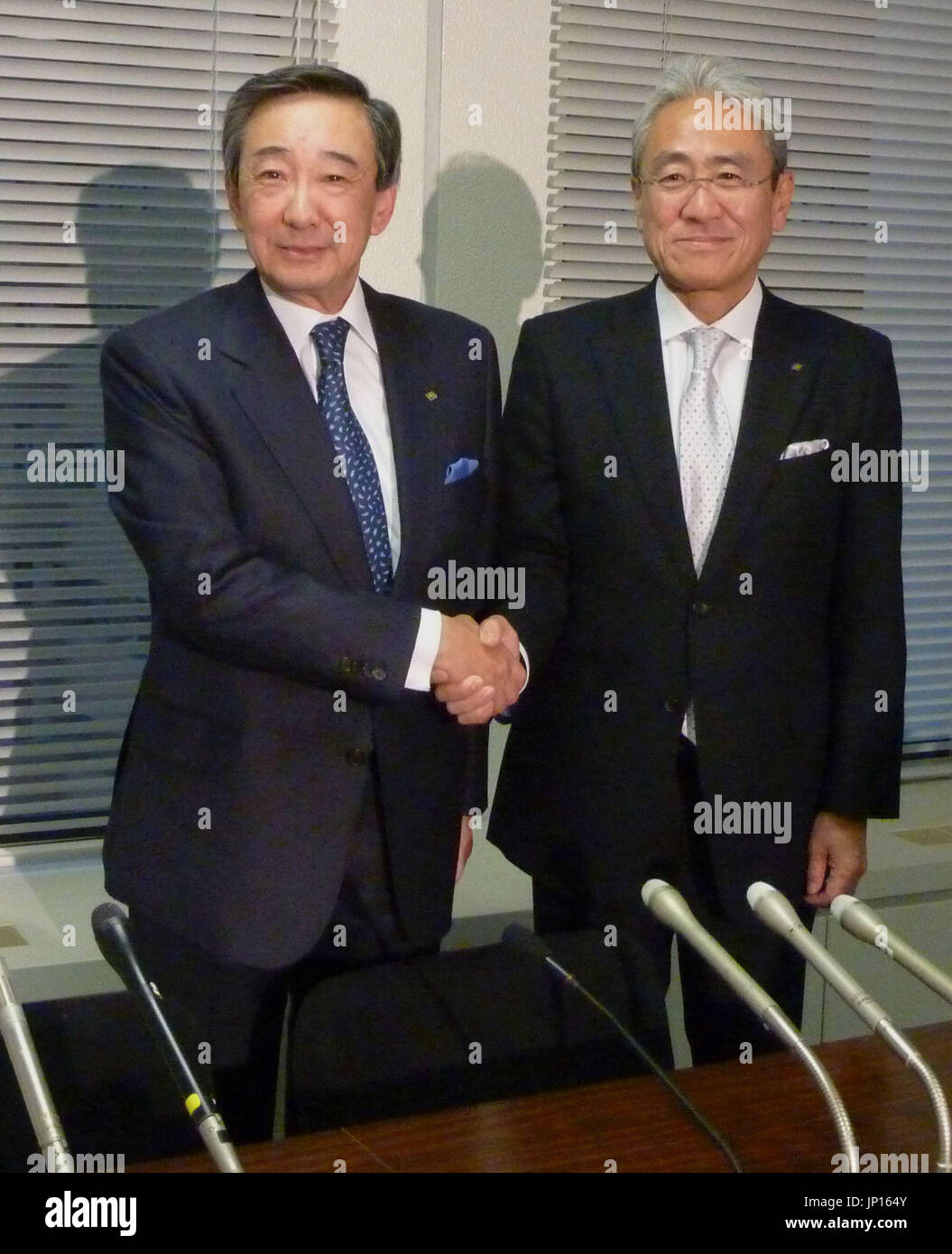 TOKYO, Japan - Marubeni Corp. President Teruo Asada (L) and Senior ...