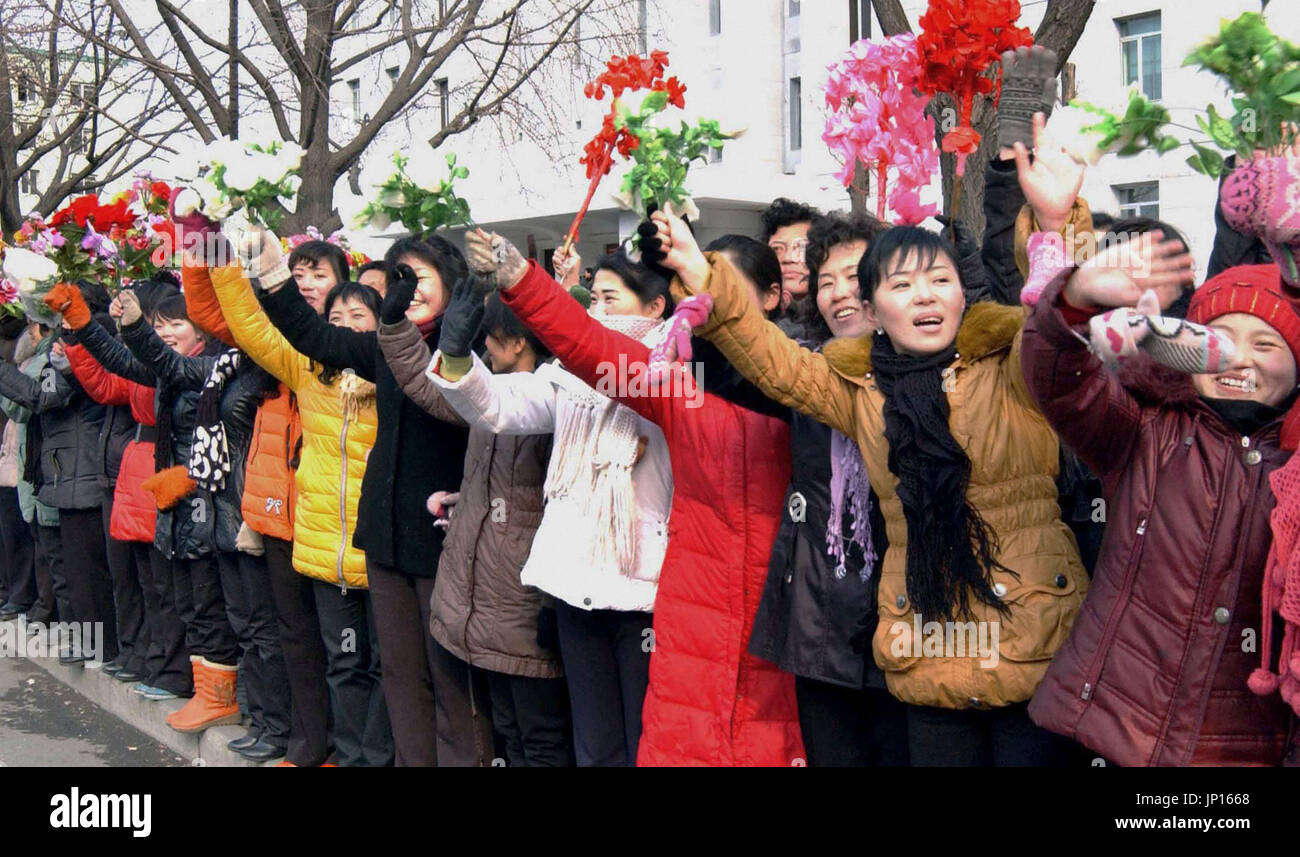 PYONGYANG, North Korea - North Koreans line streets in Pyongyang on Feb ...