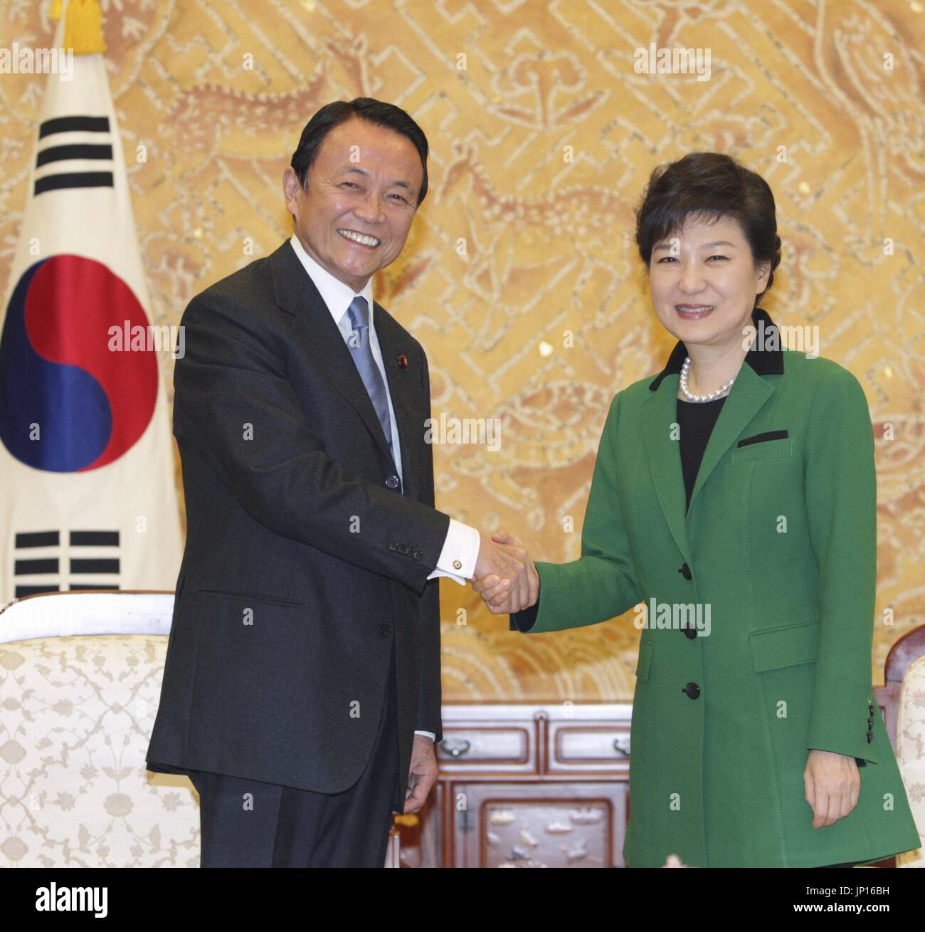 SEOUL, South Korea - Japanese Deputy Prime Minister Taro Aso (L) and ...