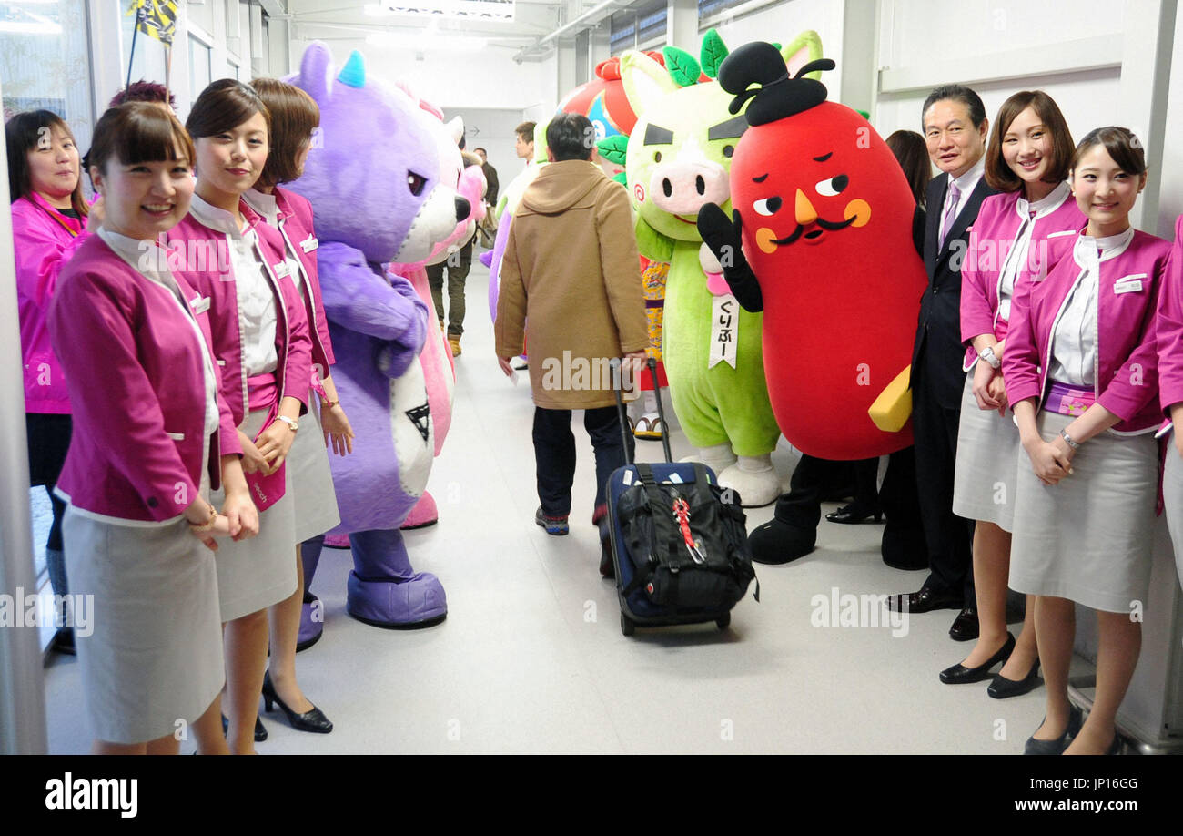 KANSAI AIRPORT, Japan - Cabin attendants of Peach Aviation Ltd. and ...
