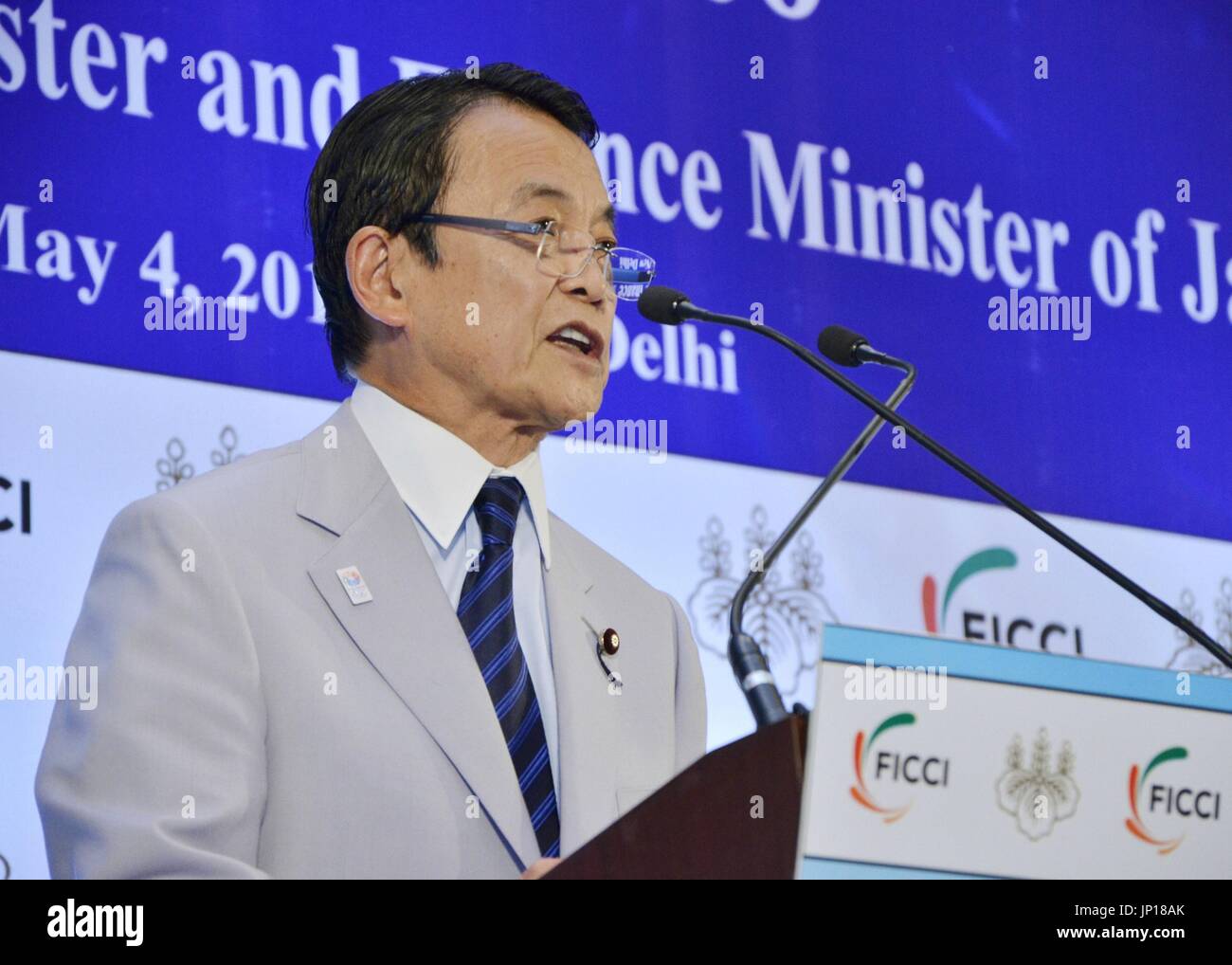 NEW DELHI, India - Japanese Finance Minister Taro Aso delivers a speech ...