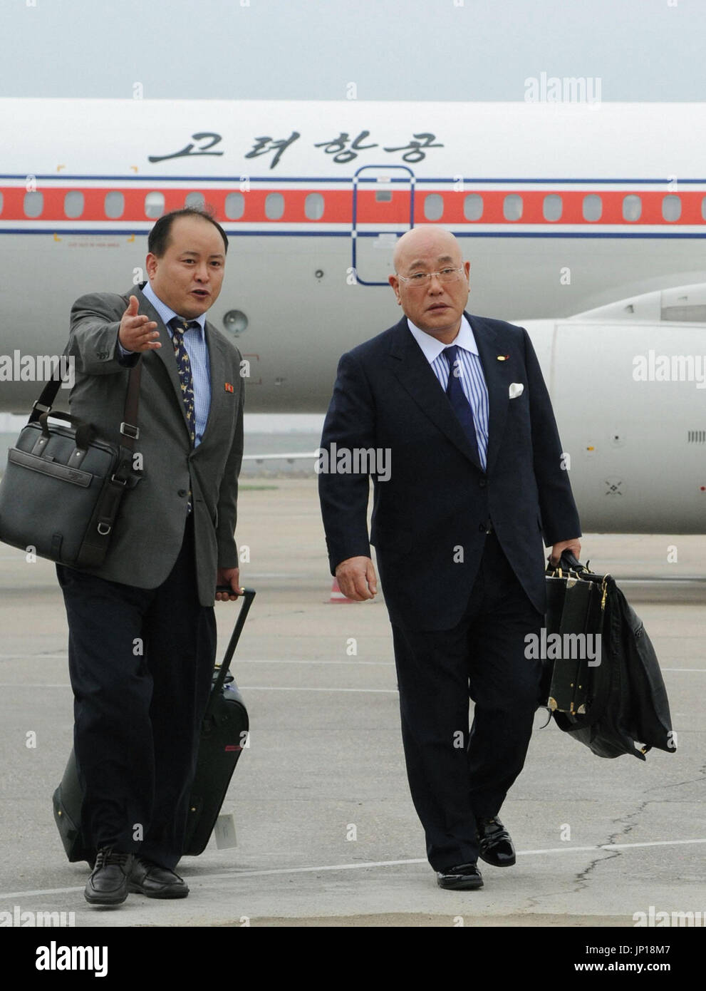 PYONGYANG, North Korea - Isao Iijima (R), an adviser to Japanese Prime ...
