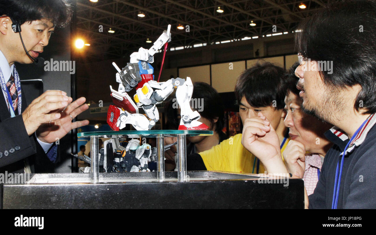 SHIZUOKA, Japan - Visitors view new plastic models from the Mobile Suit ...