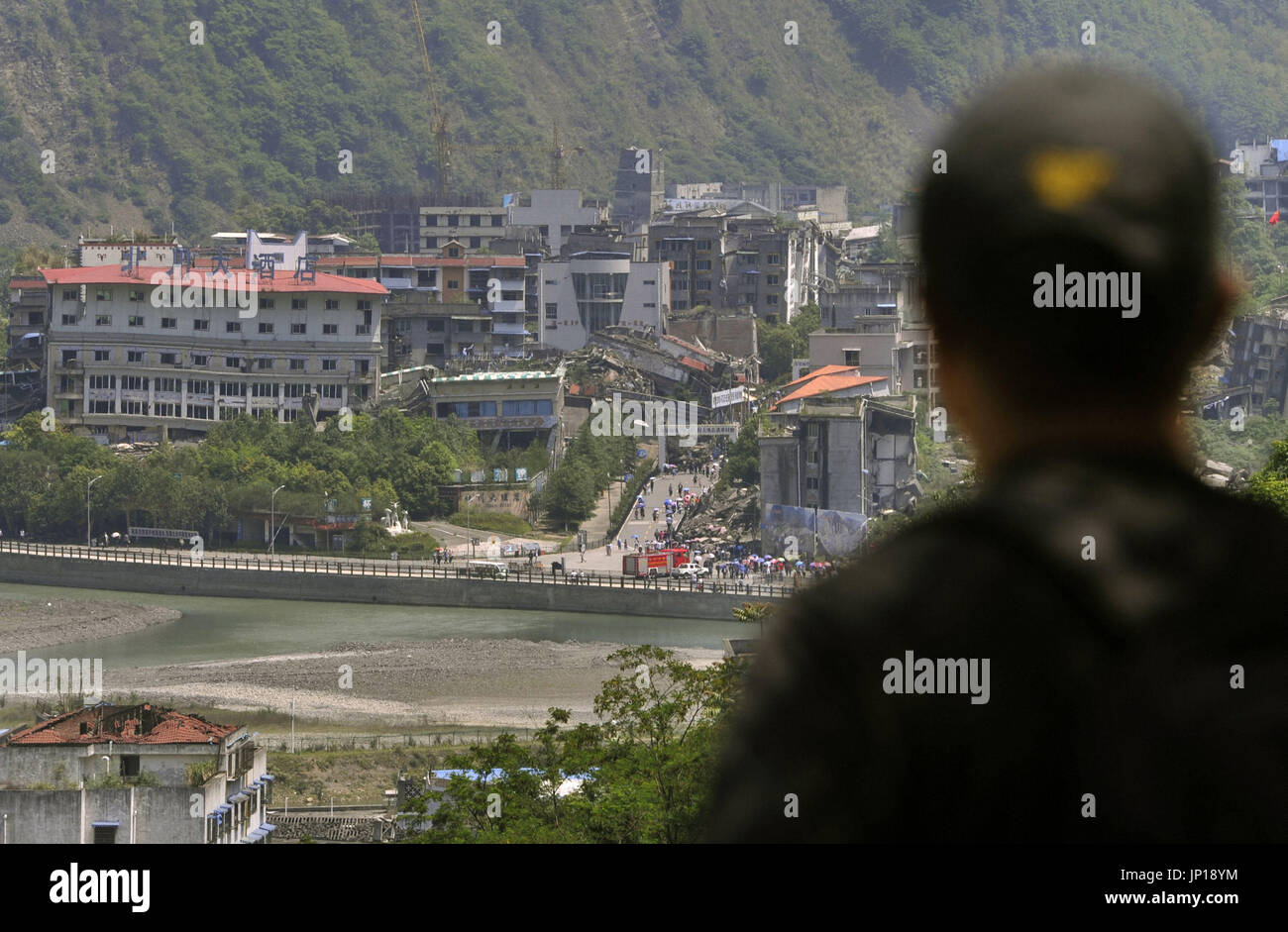 BEICHUAN, China - A visitor views "earthquake relics" preserved in ...