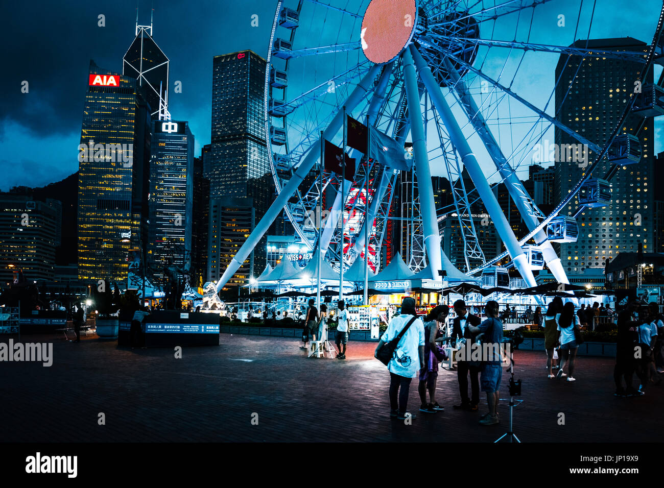 tourist walking on the waterfront at night Stock Photo - Alamy