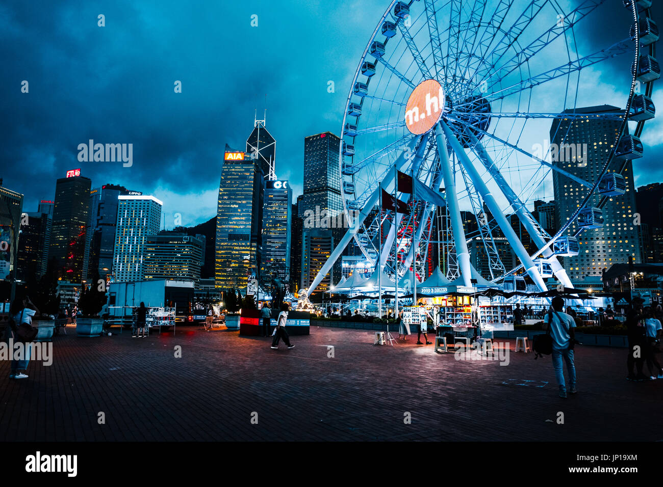 tourist walking on the waterfront at night Stock Photo - Alamy