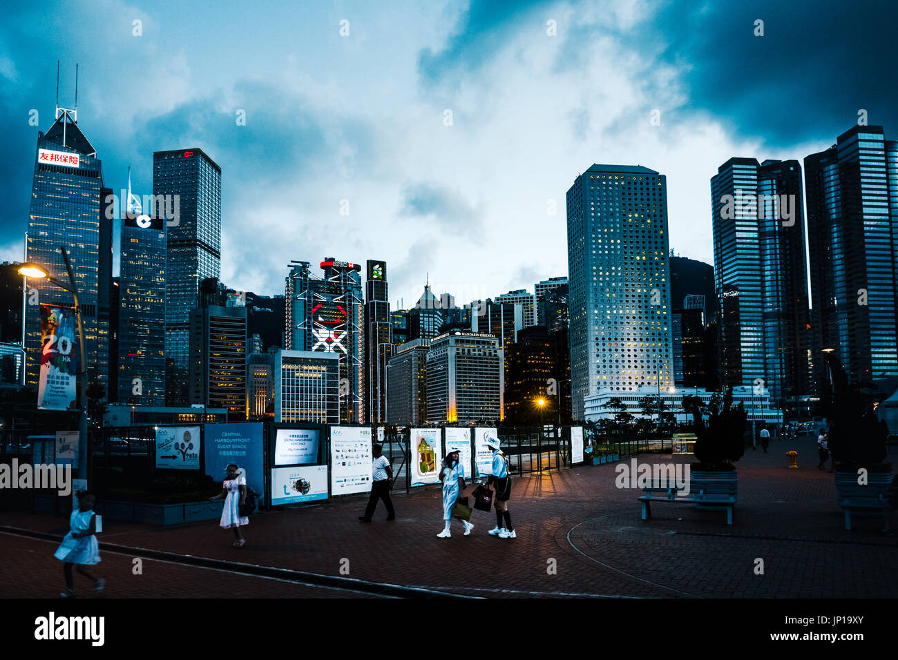 tourist walking on the waterfront at night Stock Photo - Alamy