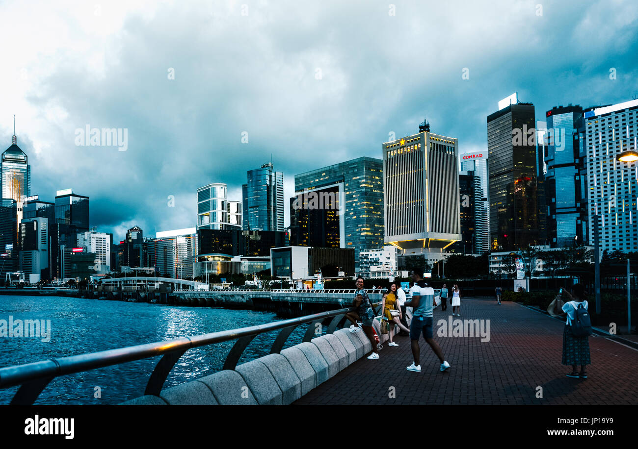 tourist walking on the waterfront at night Stock Photo - Alamy