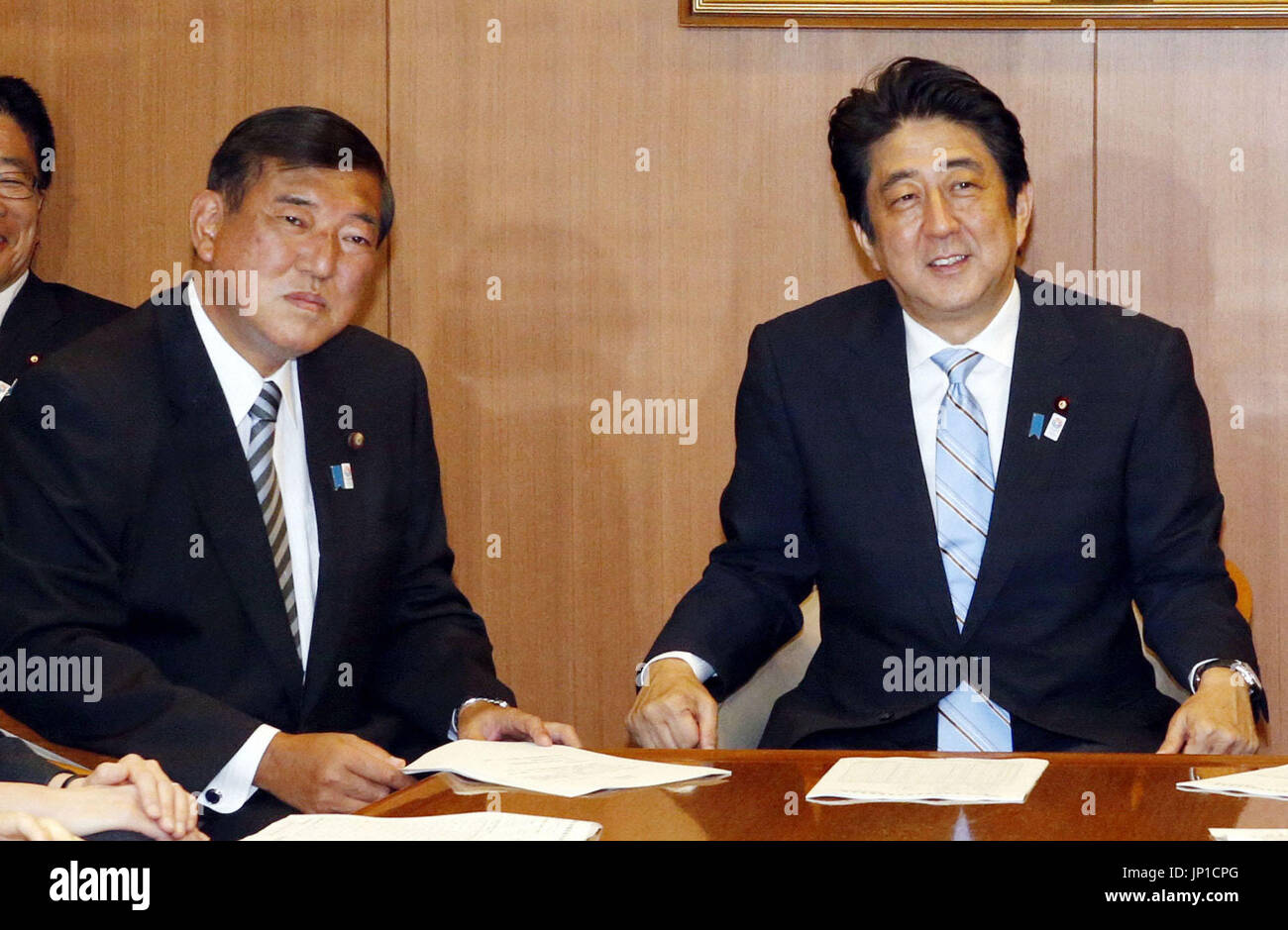 TOKYO, Japan - Prime Minster Shinzo Abe (R) and Shigeru Ishiba ...