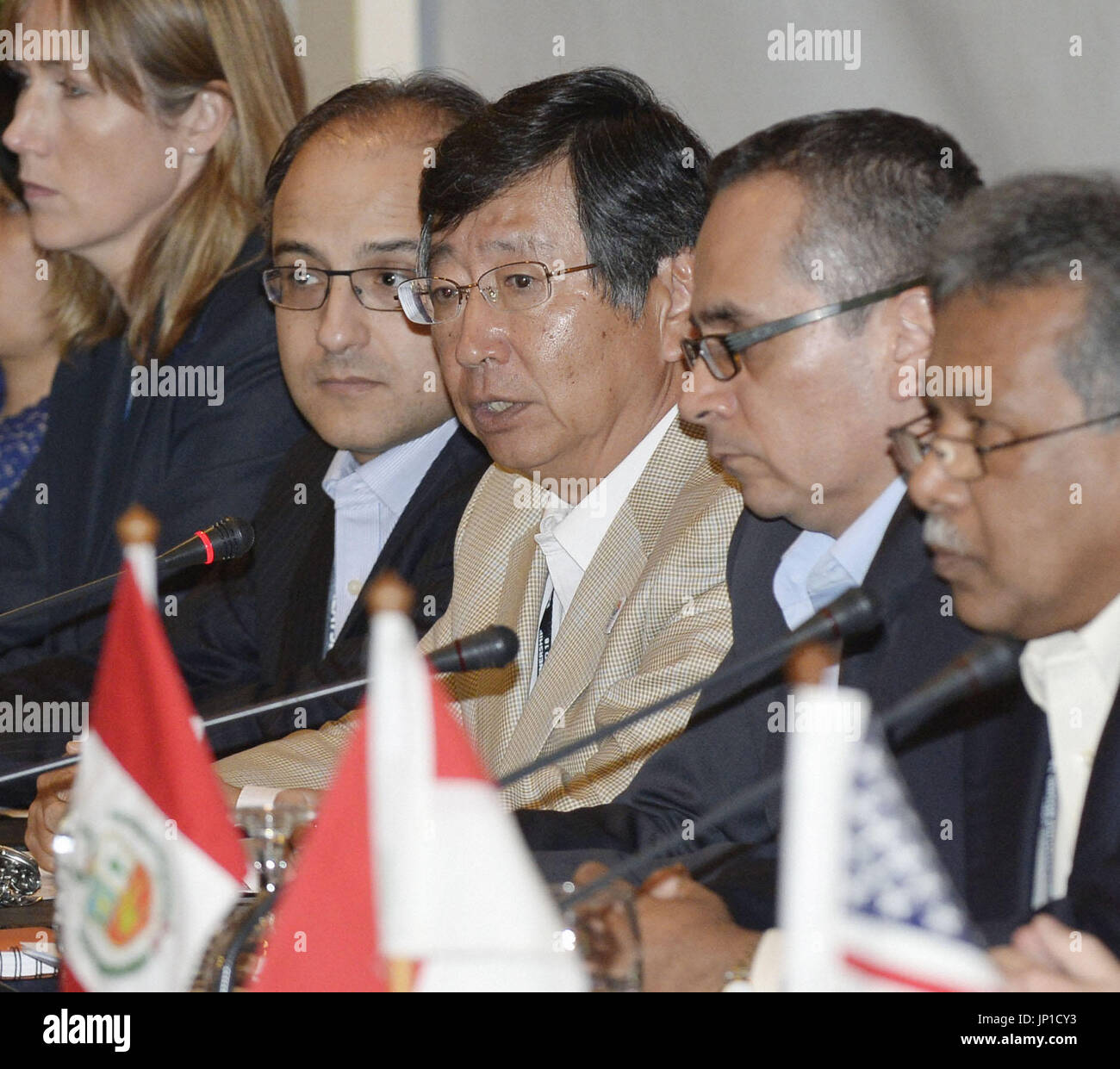 KOTA KINABALU, Malaysia - Koji Tsuruoka (C), Japan's chief negotiator ...