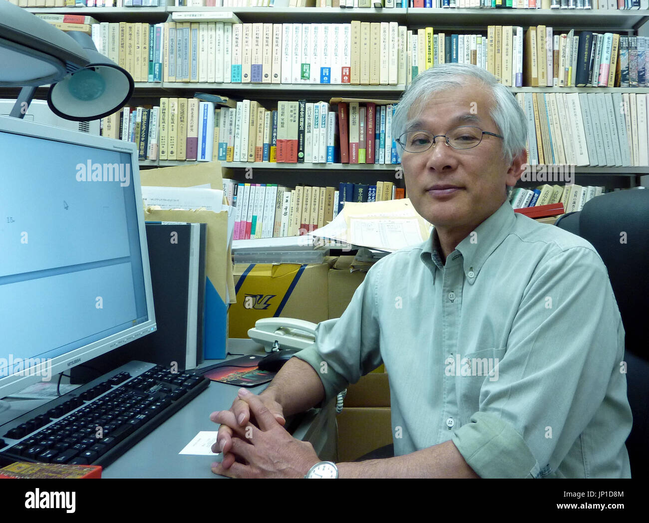 TOKYO, Japan - Masahito Ando, professor of archival science at Gakushuin University's graduate ...