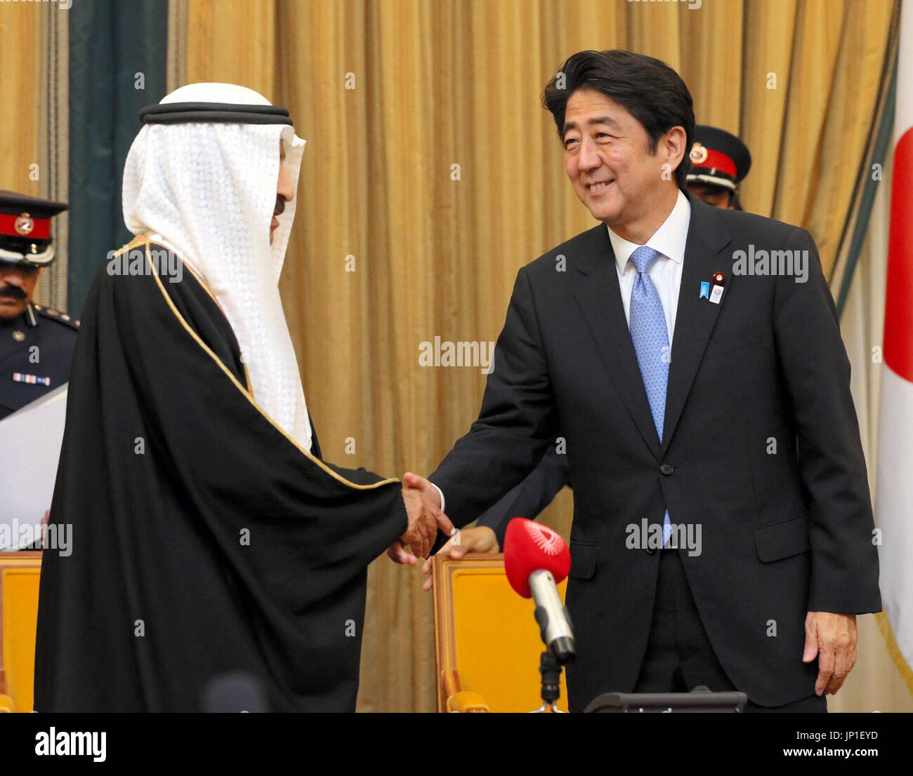 MANAMA, Bahrain - Japanese Prime Minister Shinzo Abe (R) and Prince ...