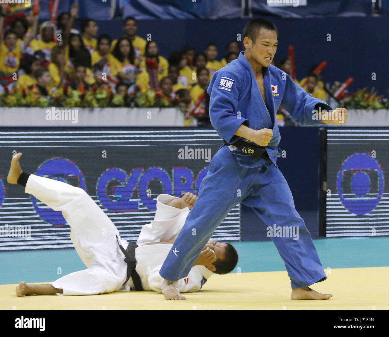 RIO DE JANEIRO, Brazil - Japan's Masashi Ebinuma (R) celebrates after ...