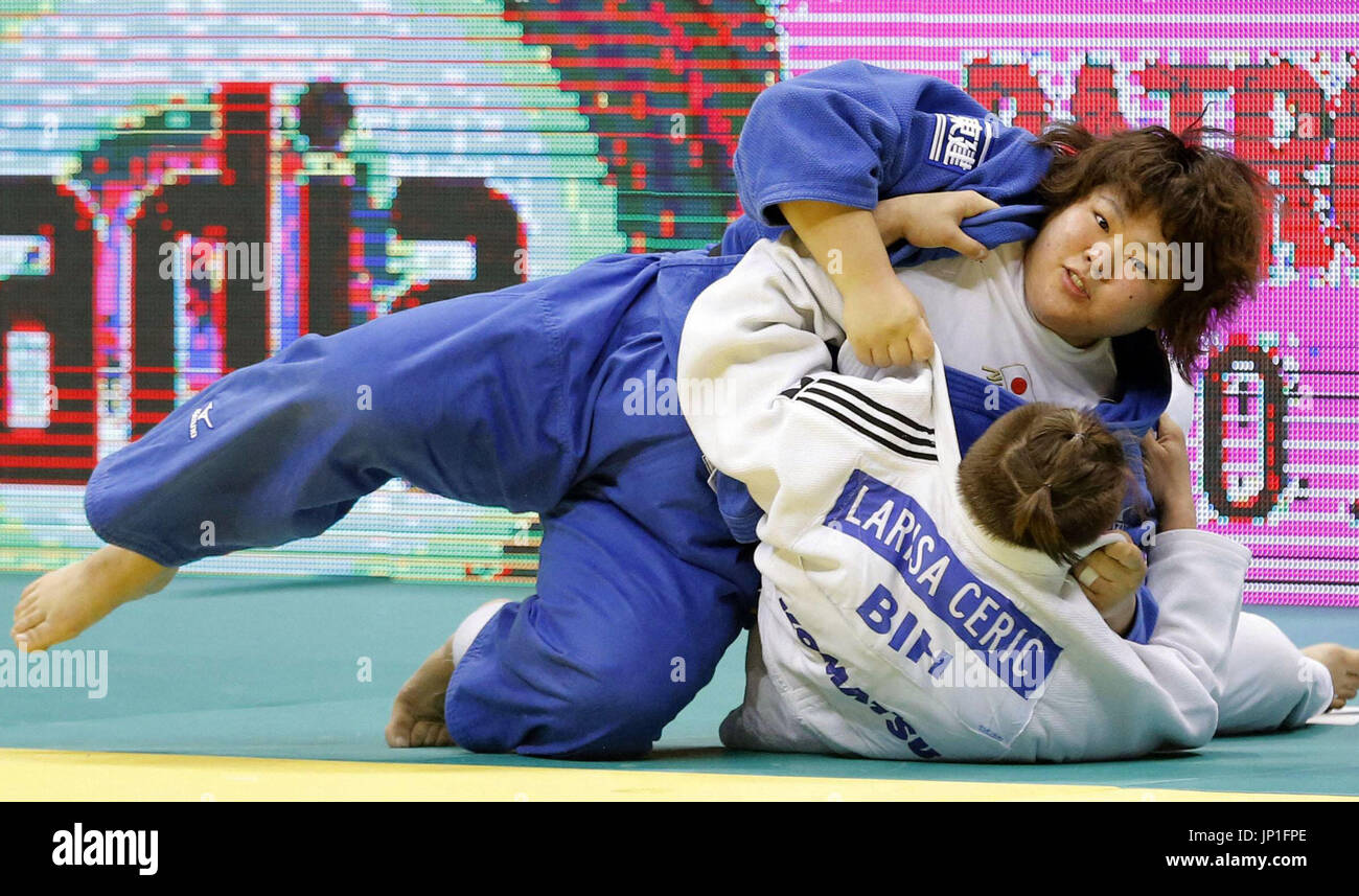 RIO DE JANEIRO, Brazil - Japan's Megumi Tachimoto (top) defeats Larisa ...
