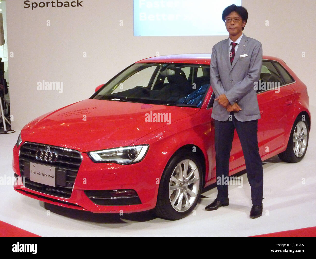 TOKYO, Japan - Hiroshi Okita, president of Audi Japan K.K., unveils the ...