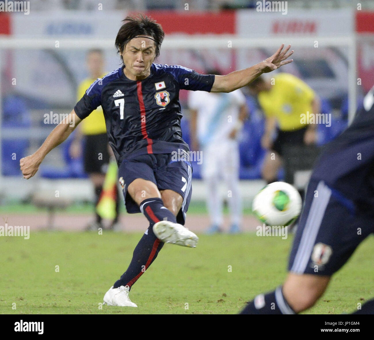 OSAKA, Japan - Japan midfielder Yasuhito Endo scores on the team's ...