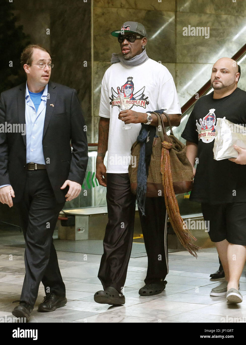 PYONGYANG, North Korea - Former U.S. basketball star Dennis Rodman (C ...