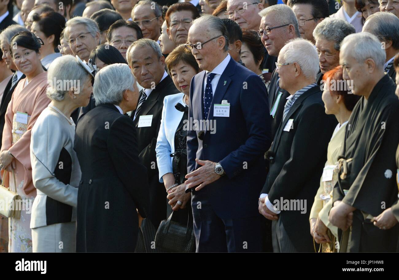 TOKYO, Japan - Emperor Akihito (pictured from behind) and Empress ...
