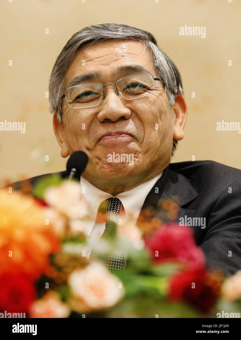OSAKA, Japan - Bank of Japan Governor Haruhiko Kuroda smiles during a ...