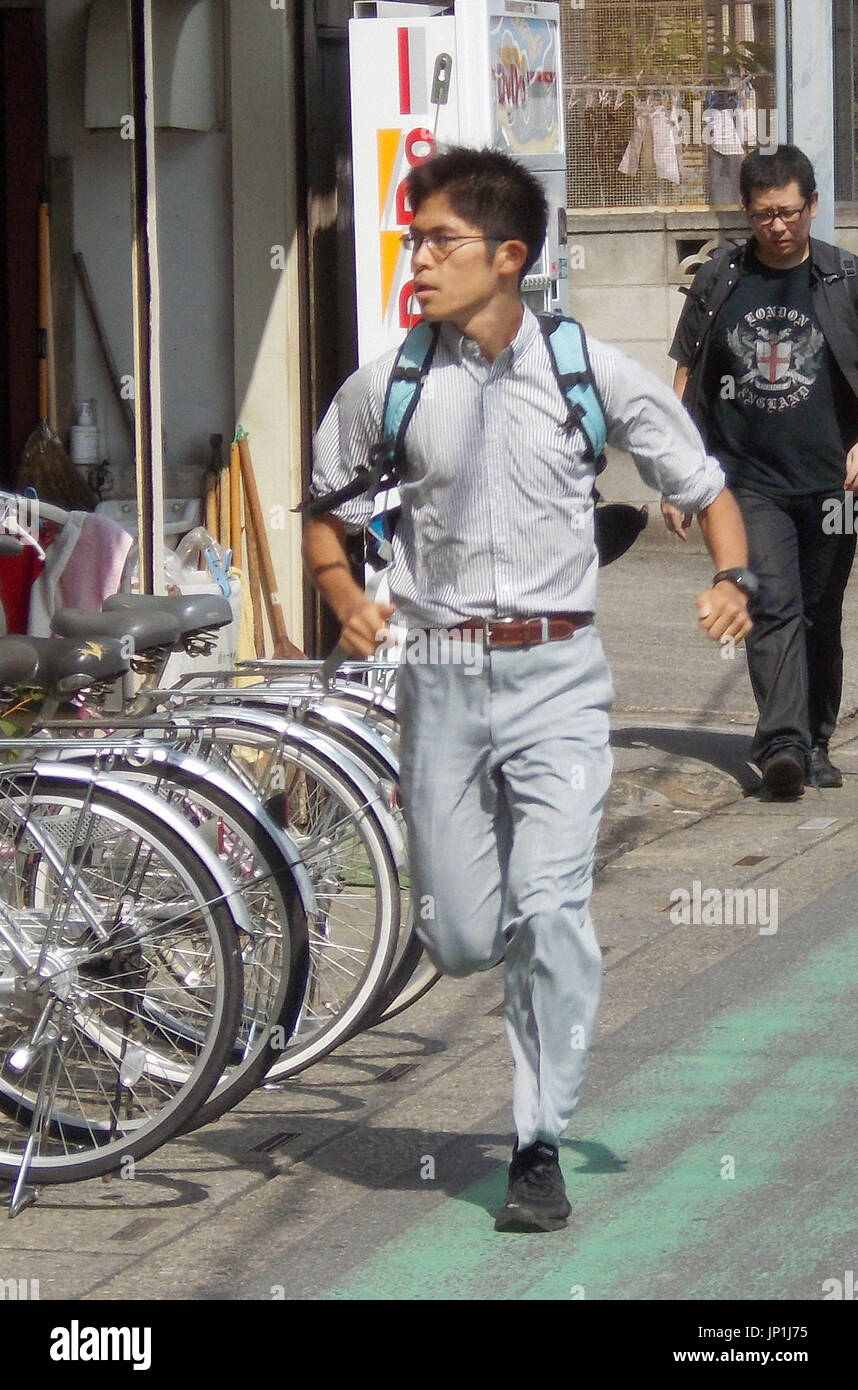 TOKYO, Japan - Yuki Kawauchi, a top "citizen runner" in Japan, runs ...