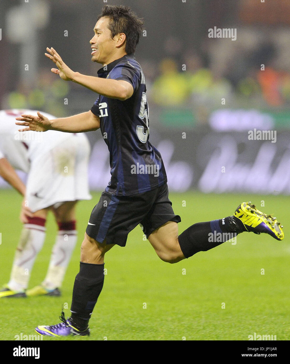 MILAN, Italy - Inter Milan defender Yuto Nagatomo reacts after scoring ...