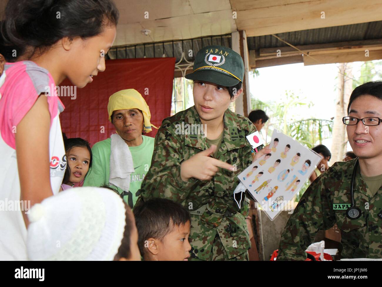 TABOGON, Philippines - Capt. Yuko Arashina, a nurse with Japan's Self ...