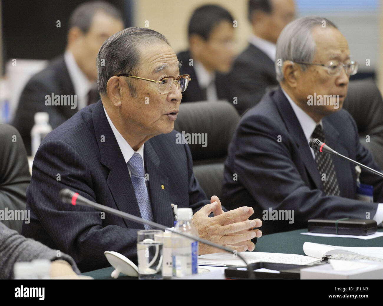 BEIJING, China - Fujio Cho (L), Toyota Motor Corp. honorary chairman ...