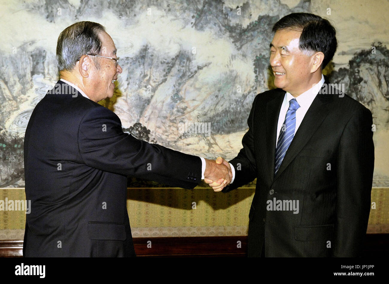 BEIJING, China - Fujio Cho (L), honorary chairman of Toyota Motor Corp ...