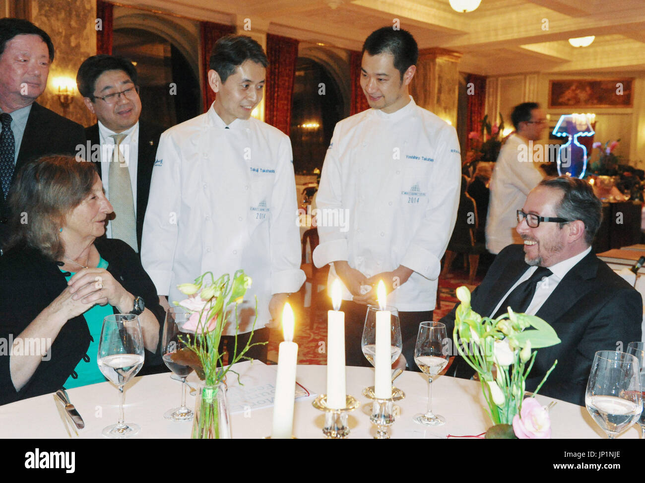 ST. MORITZ, Switzerland - Takuji Takahashi (center L), master chef at ...