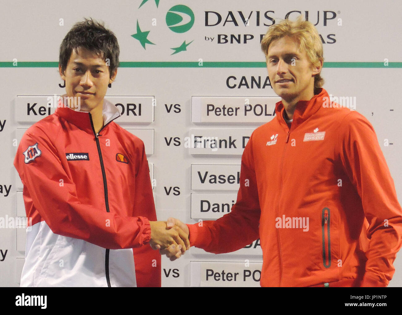 TOKYO, Japan - Japan ace Kei Nishikori (L) and Canada's Peter Polansky ...