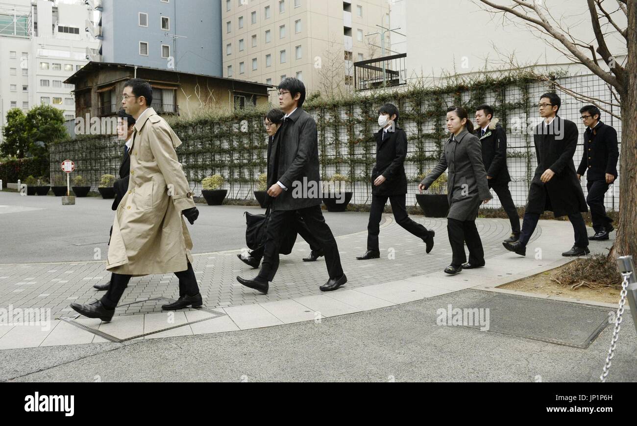TOKYO, Japan - Investigators head to the Japan Railway Construction ...