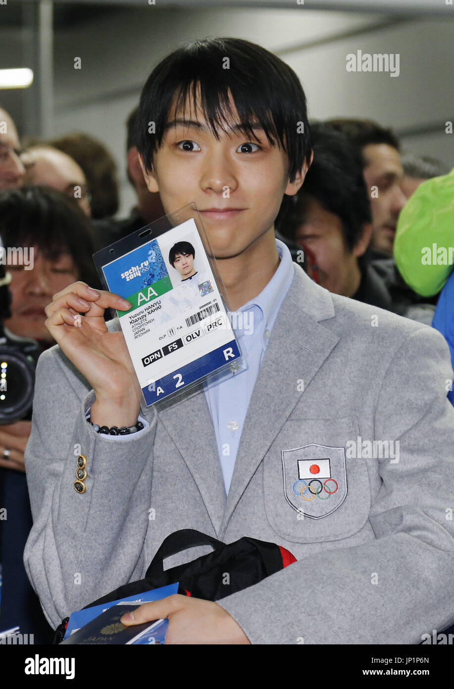 SOCHI, Russia - Japanese figure skater Yuzuru Hanyu holds his ...