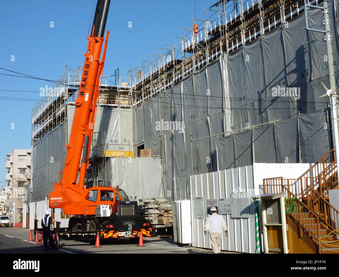 TOKYO, Japan - Photo shows a building under construction in Narashino ...