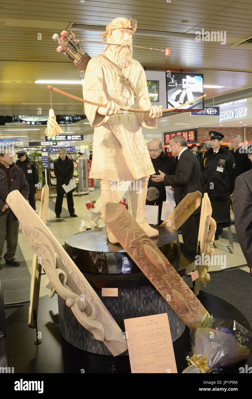 SAPPORO, Japan - A wooden statue of an elder of the indigenous Ainu ...