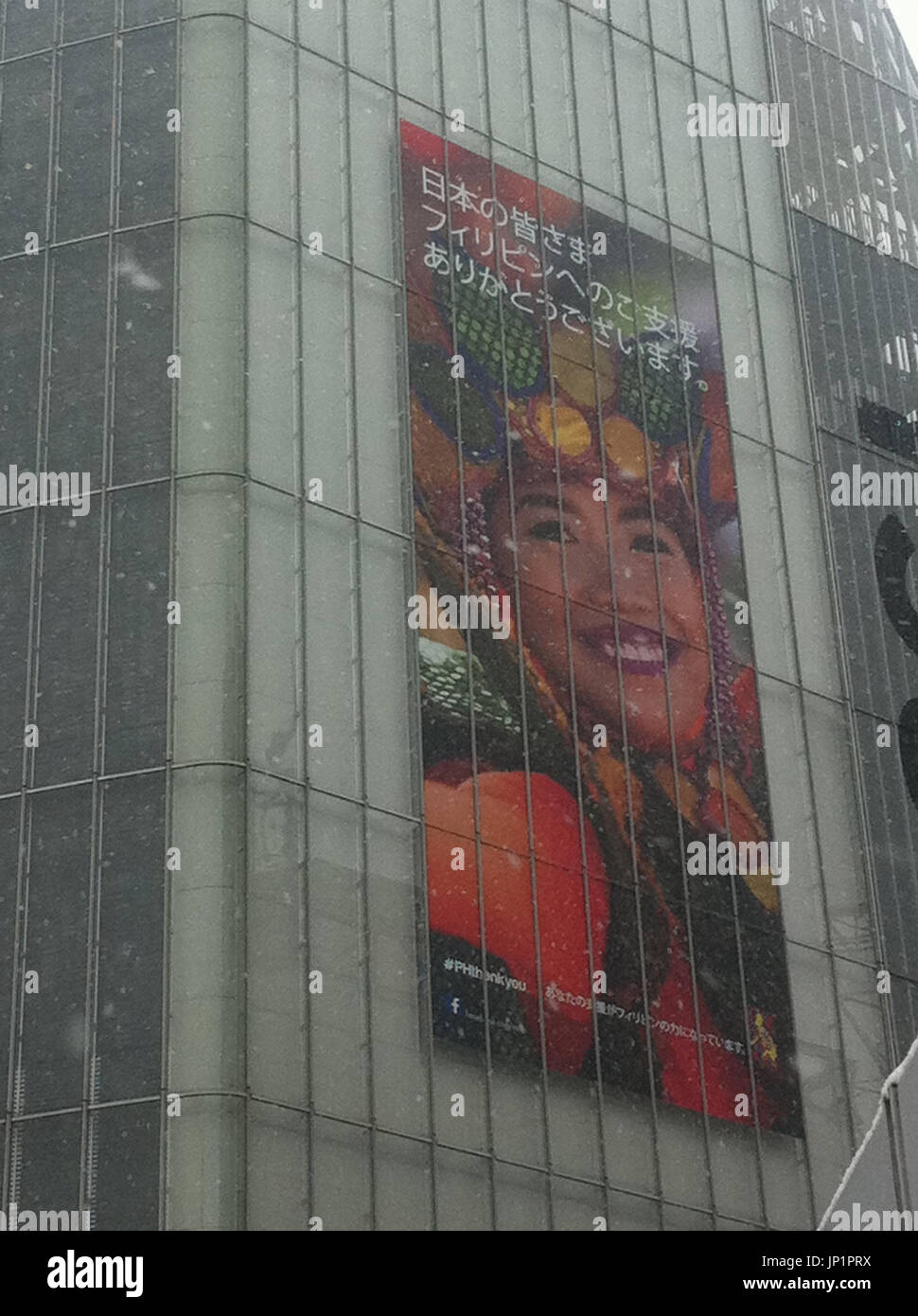 TOKYO, Japan - A large canvas banner with a Japanese message of thanks ...